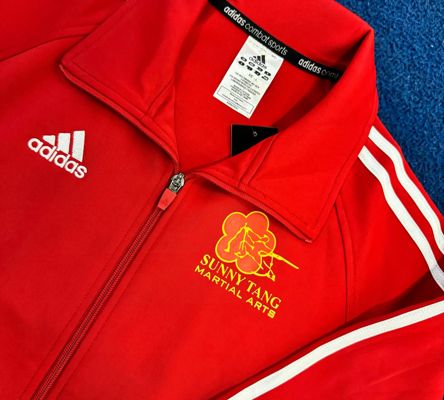 Loving our new Adidas Pulse coach jackets! The red really stands out ...